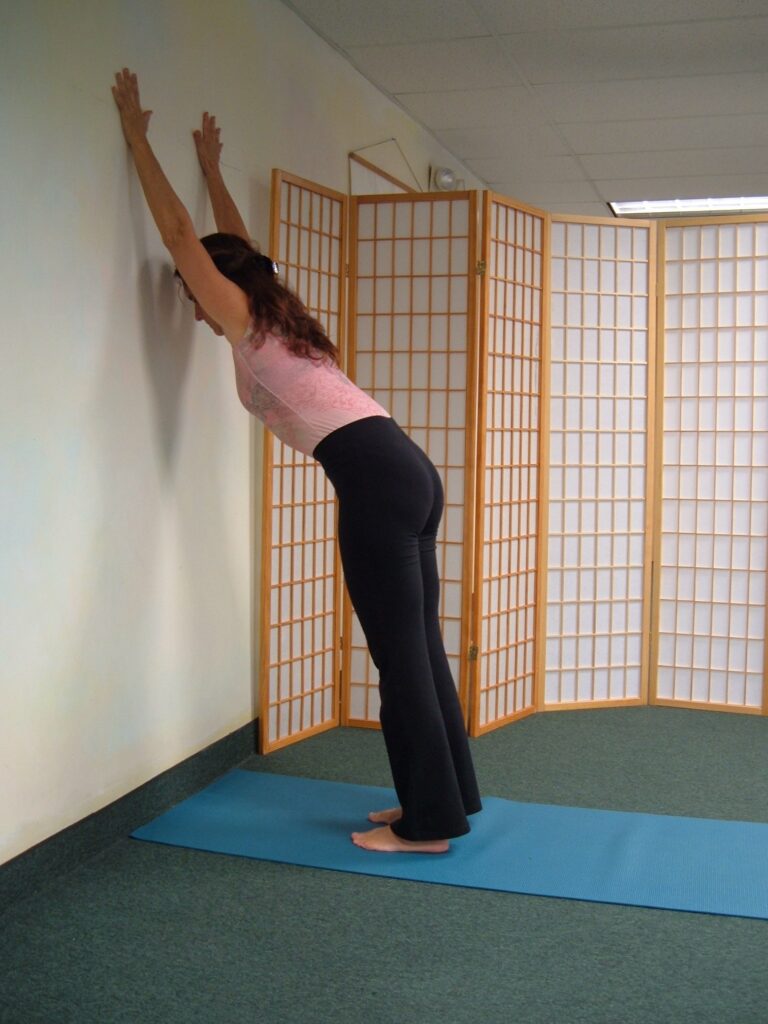 Wall Yoga Exercises: Why Practice Yoga at the Wall? - YogaUOnline